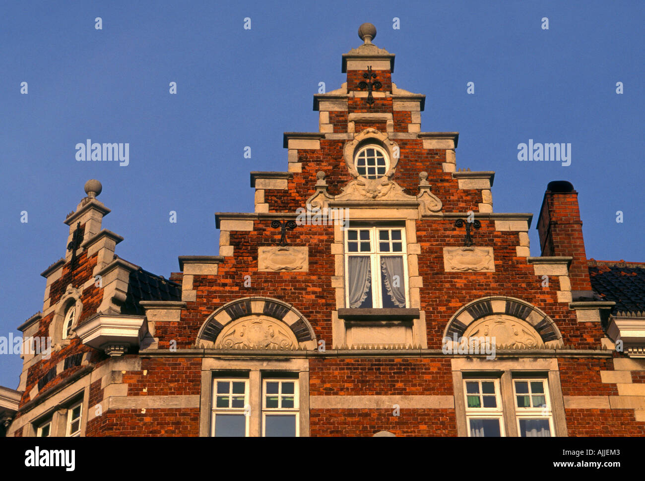 Stepped gable roof red bricks brickwork architecture along Vrigdagmarkt ...