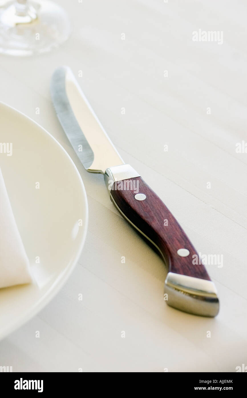 Kitchen knife on table Stock Photo - Alamy