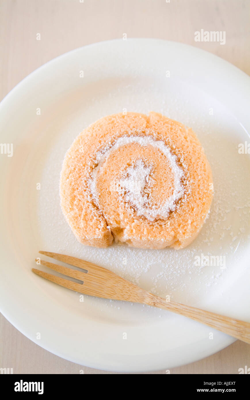 Slice of swiss roll hi-res stock photography and images - Alamy