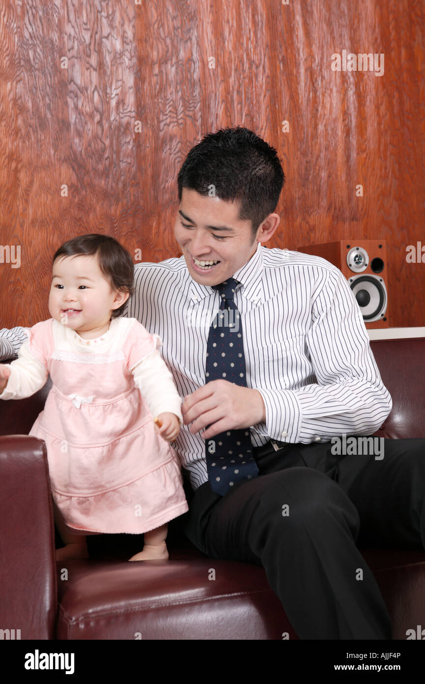 Father playing with baby Stock Photo - Alamy