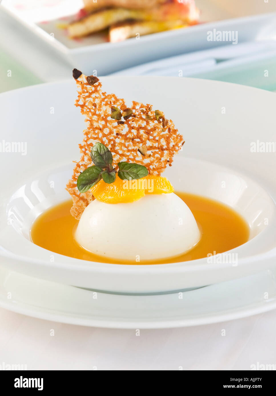 Close up of dish garnished with herbs Stock Photo - Alamy