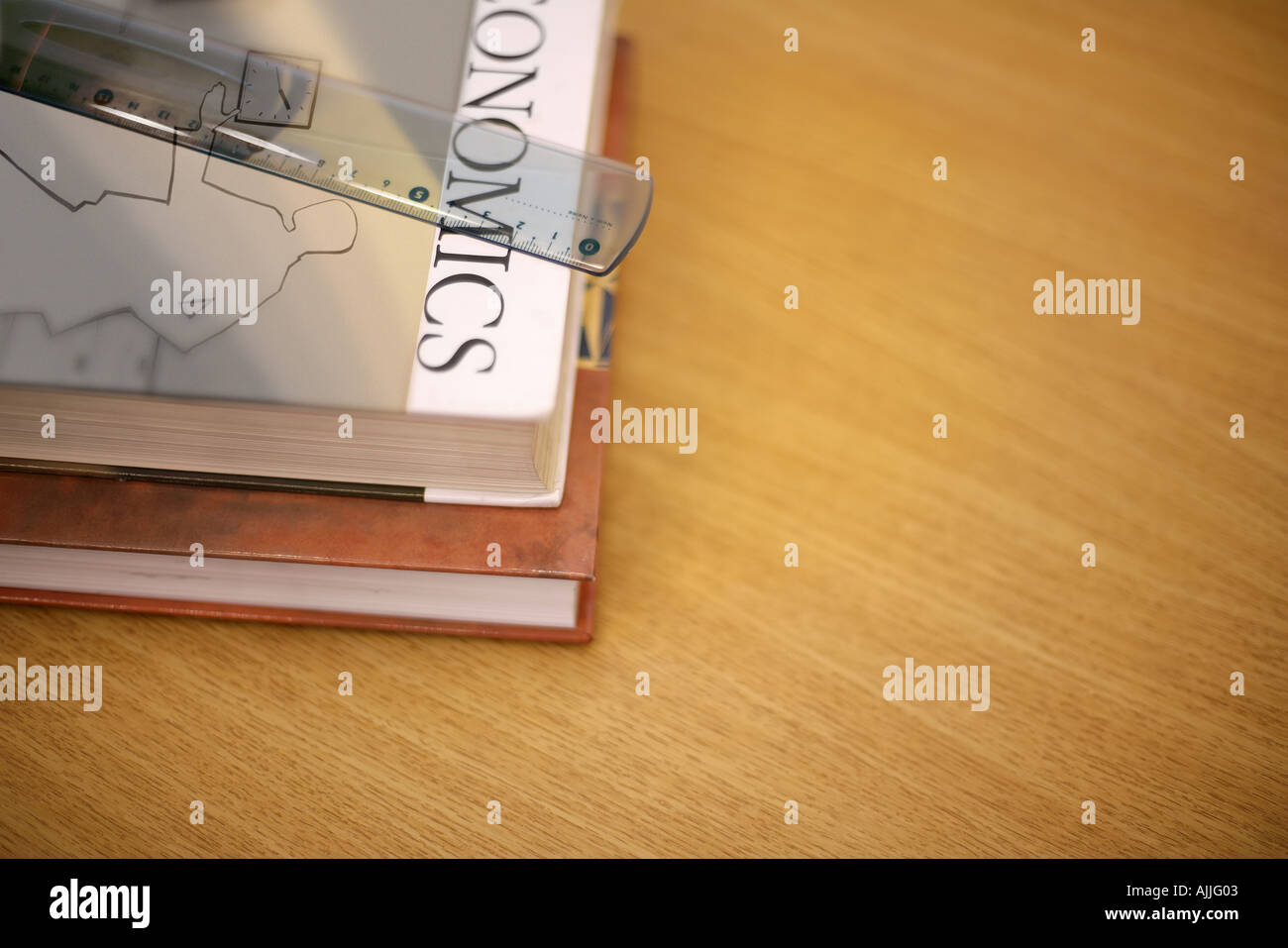 Books and a ruler Stock Photo - Alamy