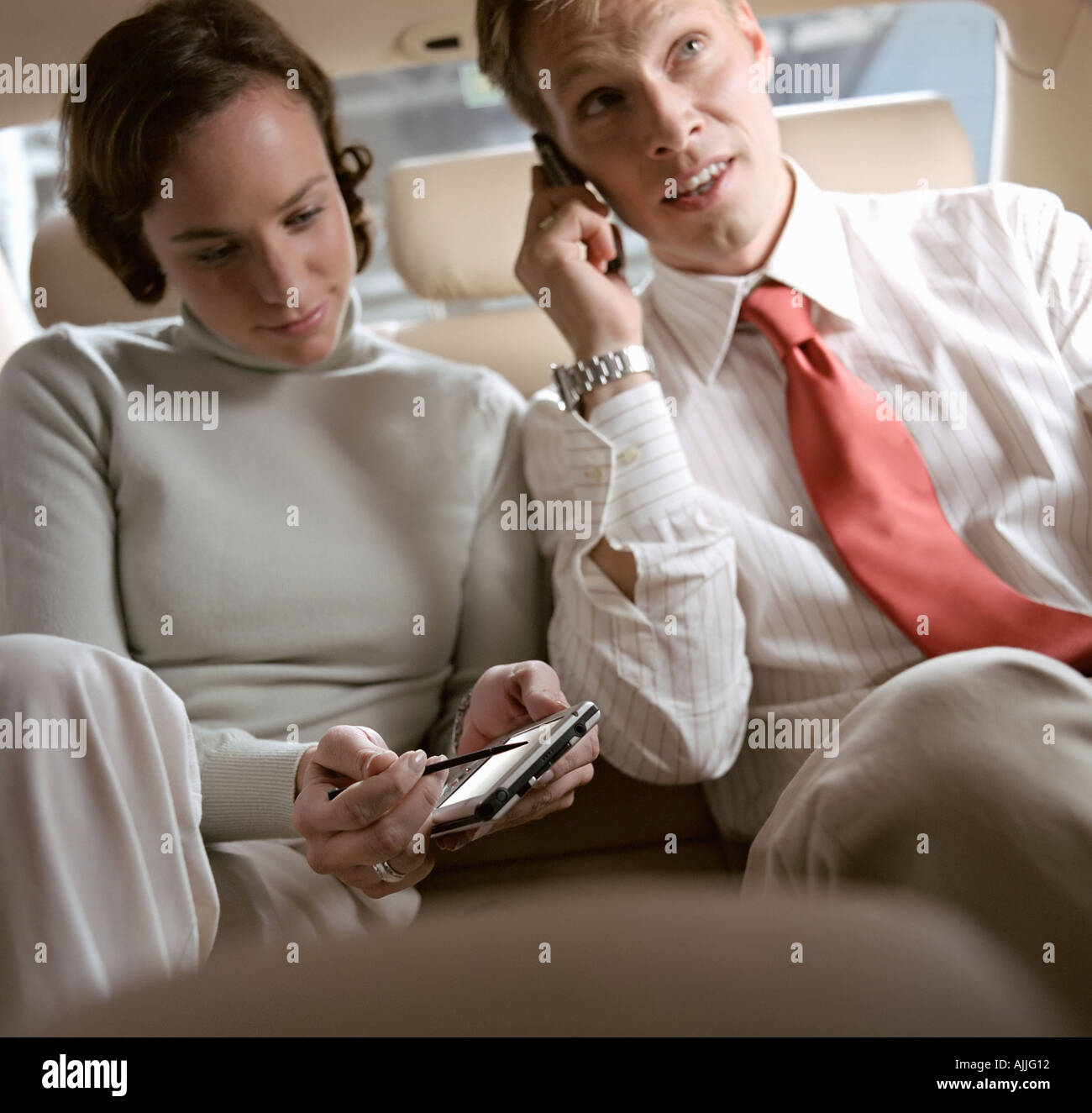 Business people in a taxi Stock Photo - Alamy