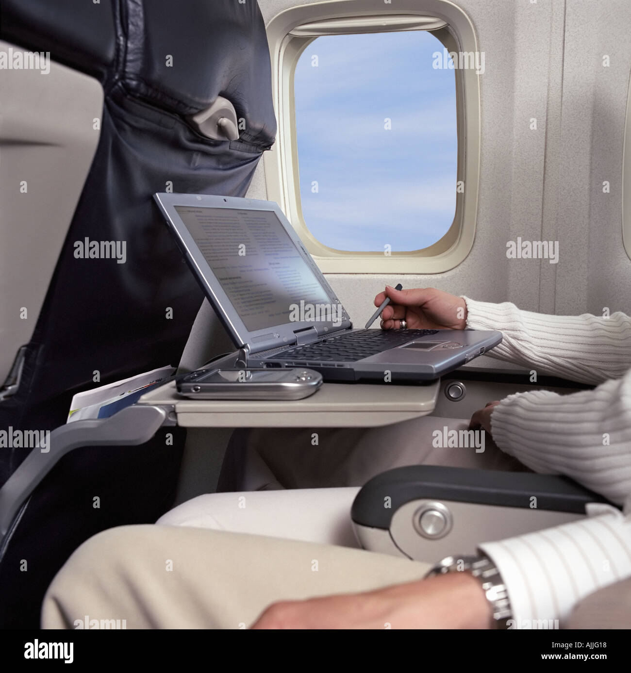 Businessman Plane Laptop Stock Photos & Businessman Plane Laptop Stock ...