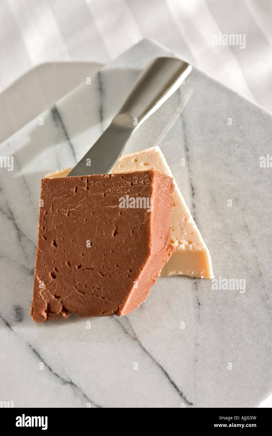 Chocolate with knife Stock Photo - Alamy