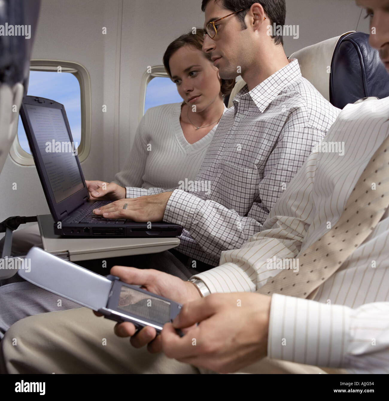 Aeroplane, laptop watch hi-res stock photography and images - Alamy