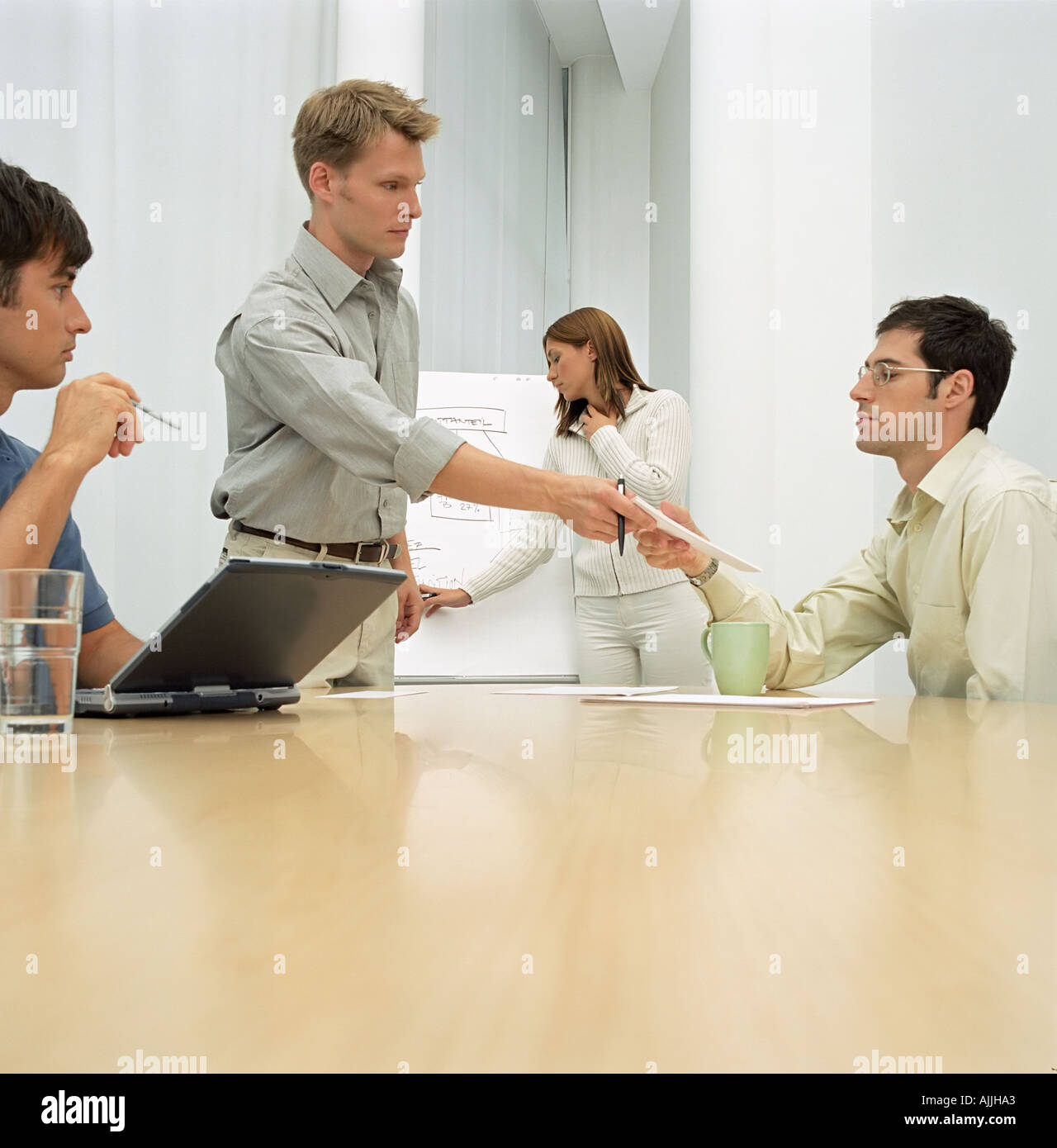 Office workers in meeting Stock Photo - Alamy
