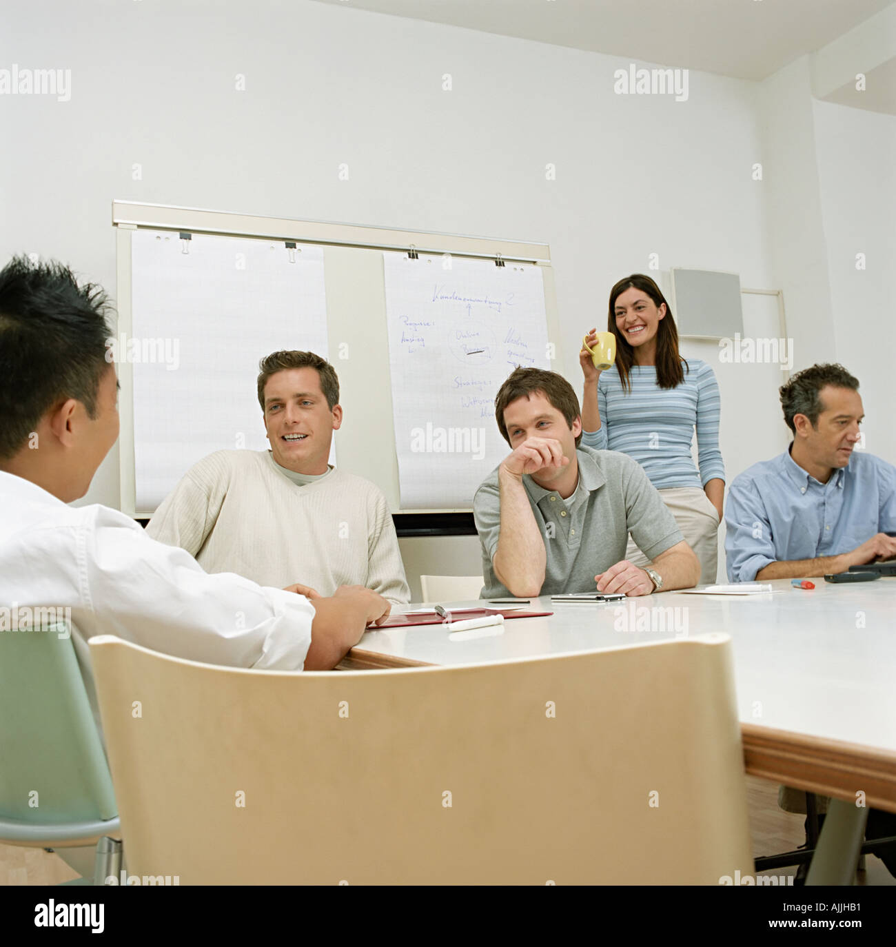 Office workers talking Stock Photo - Alamy