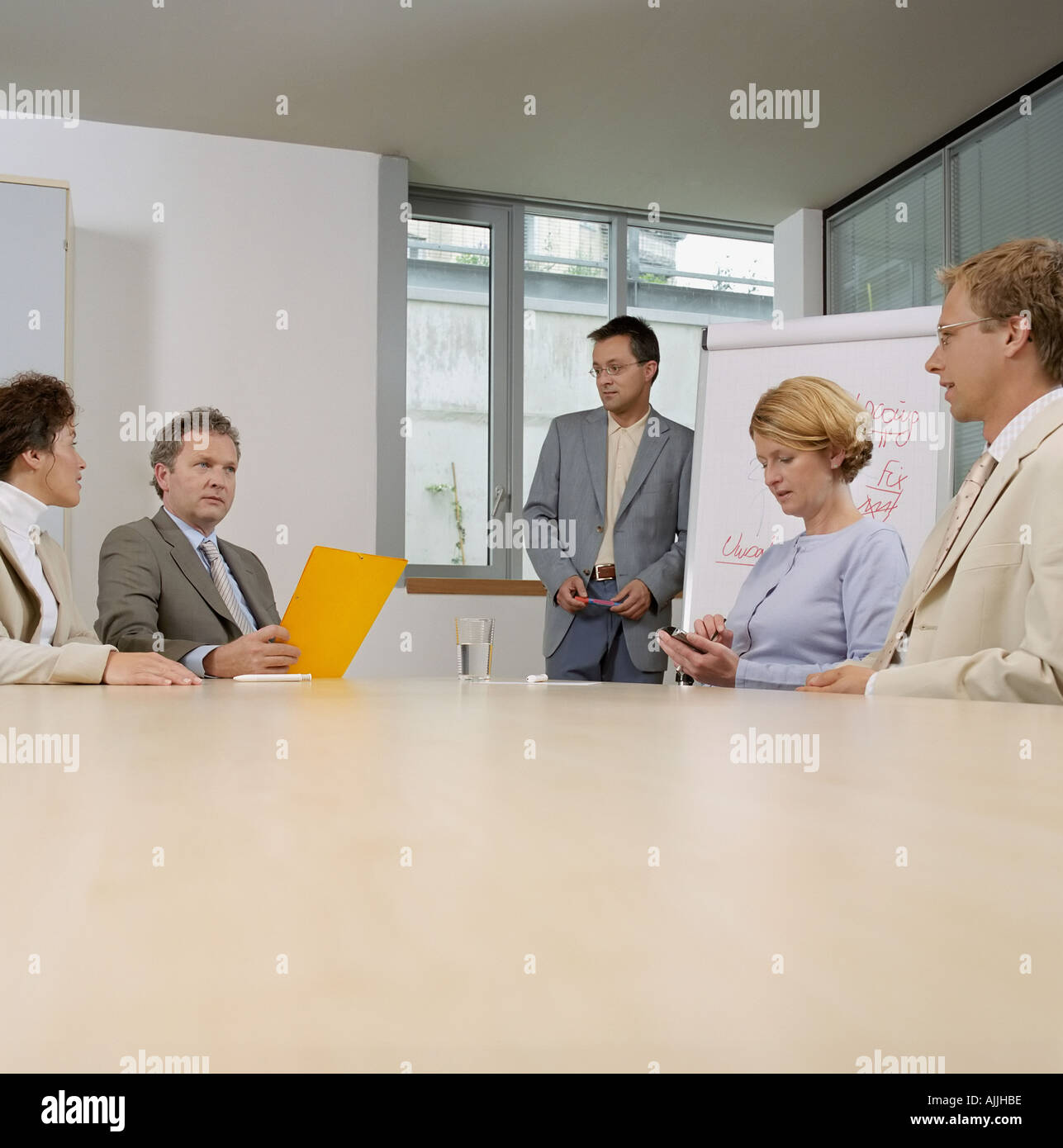 Office workers in meeting Stock Photo - Alamy
