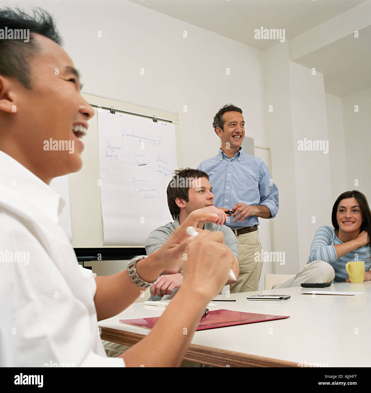 Stand four colleagues hi-res stock photography and images - Alamy