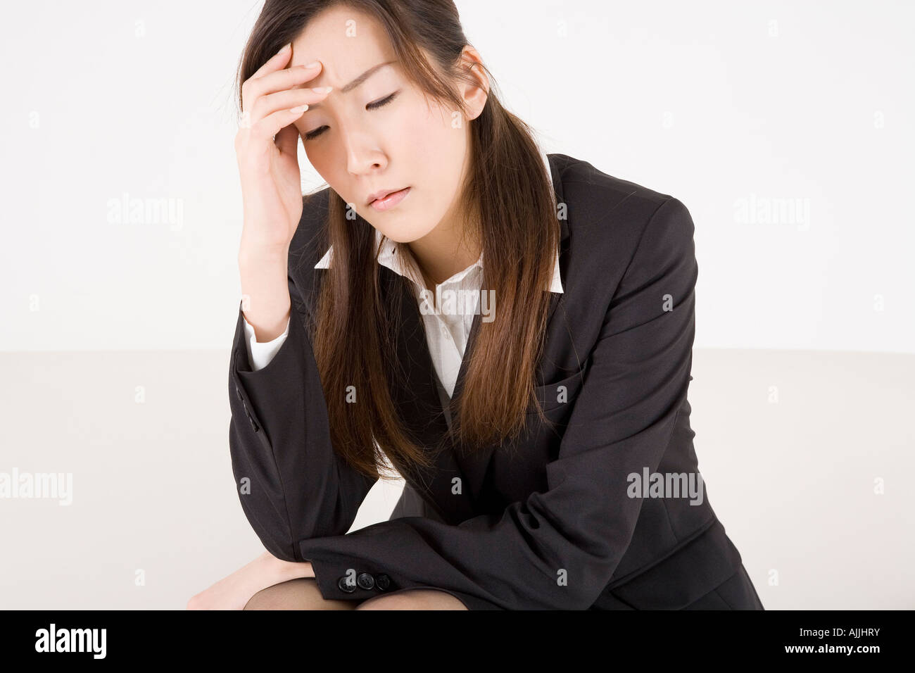 Stressed young woman Stock Photo - Alamy