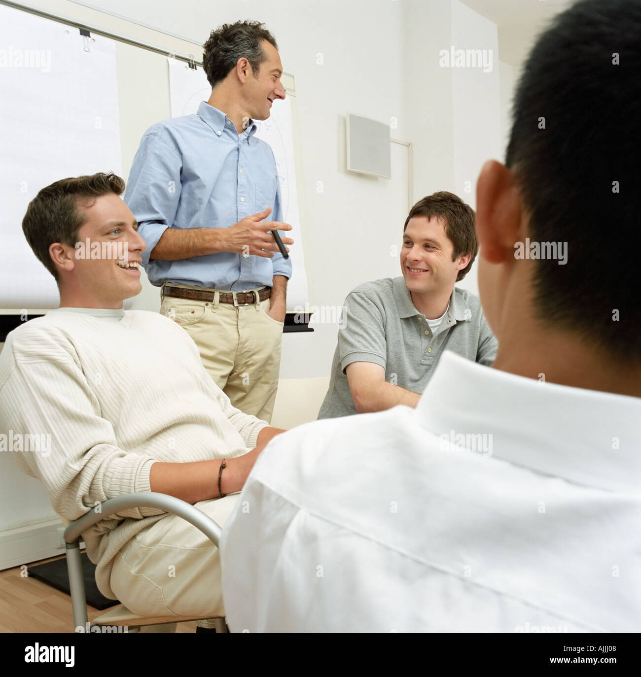 Office colleagues laughing Stock Photo - Alamy