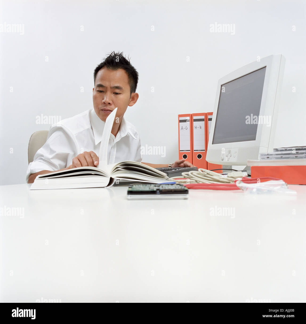 Office clerk computer desk reading hi-res stock photography and images ...