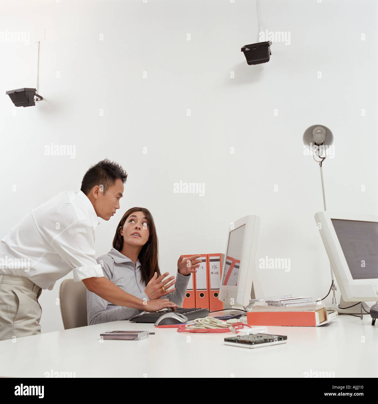 Two office workers Stock Photo - Alamy