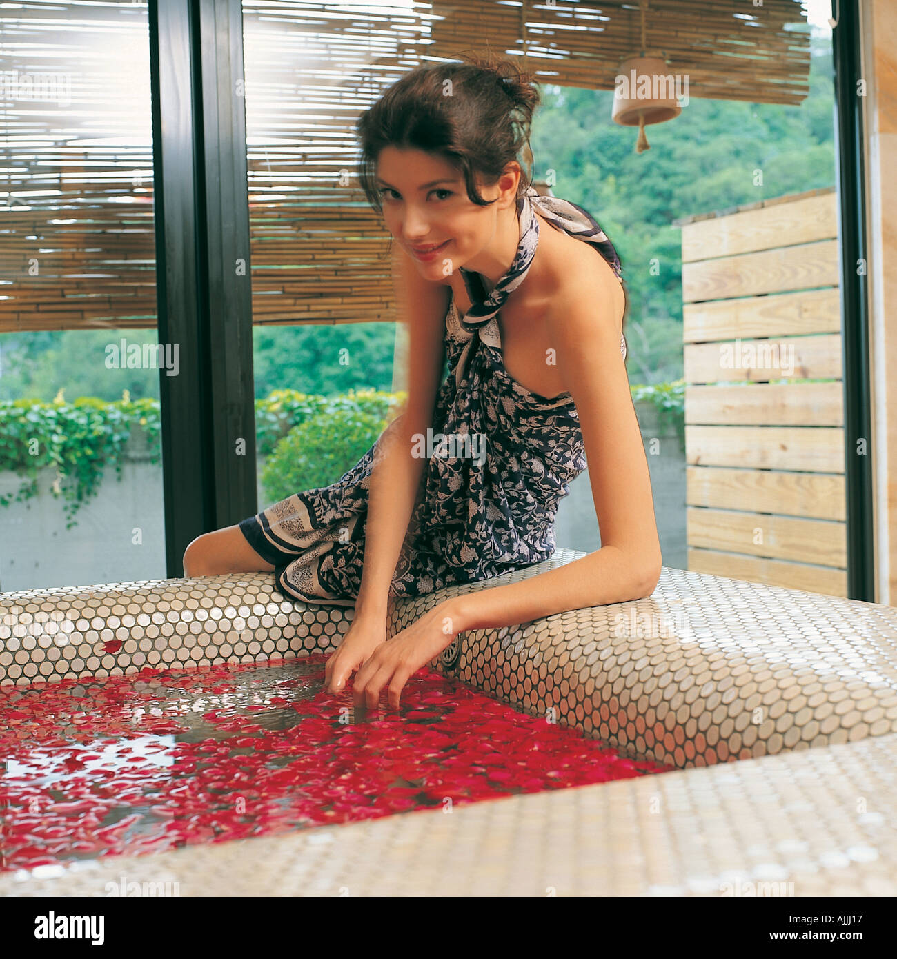 Woman indoor rose pot hi-res stock photography and images - Alamy