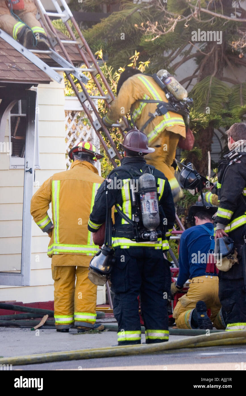 Fire fighters respond to a small structure fire, quickly dousing the ...
