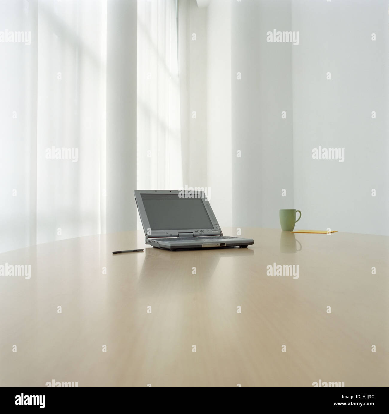 Laptop computer on desk Stock Photo - Alamy