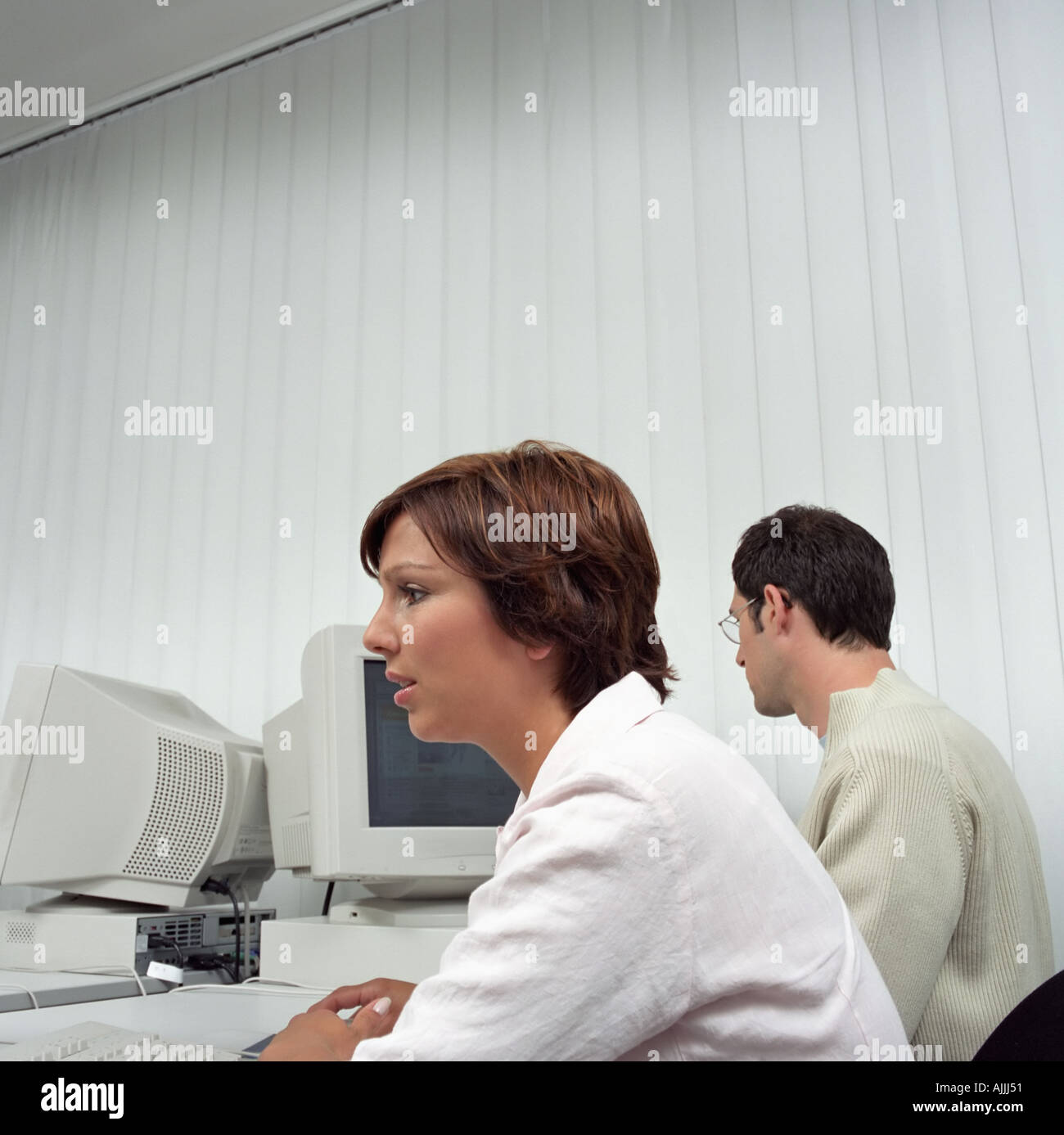 Two office workers Stock Photo - Alamy