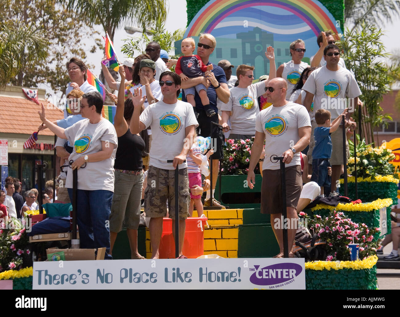 Participants in San Diego's annual Gay Pride Parade wave to the crowd ...