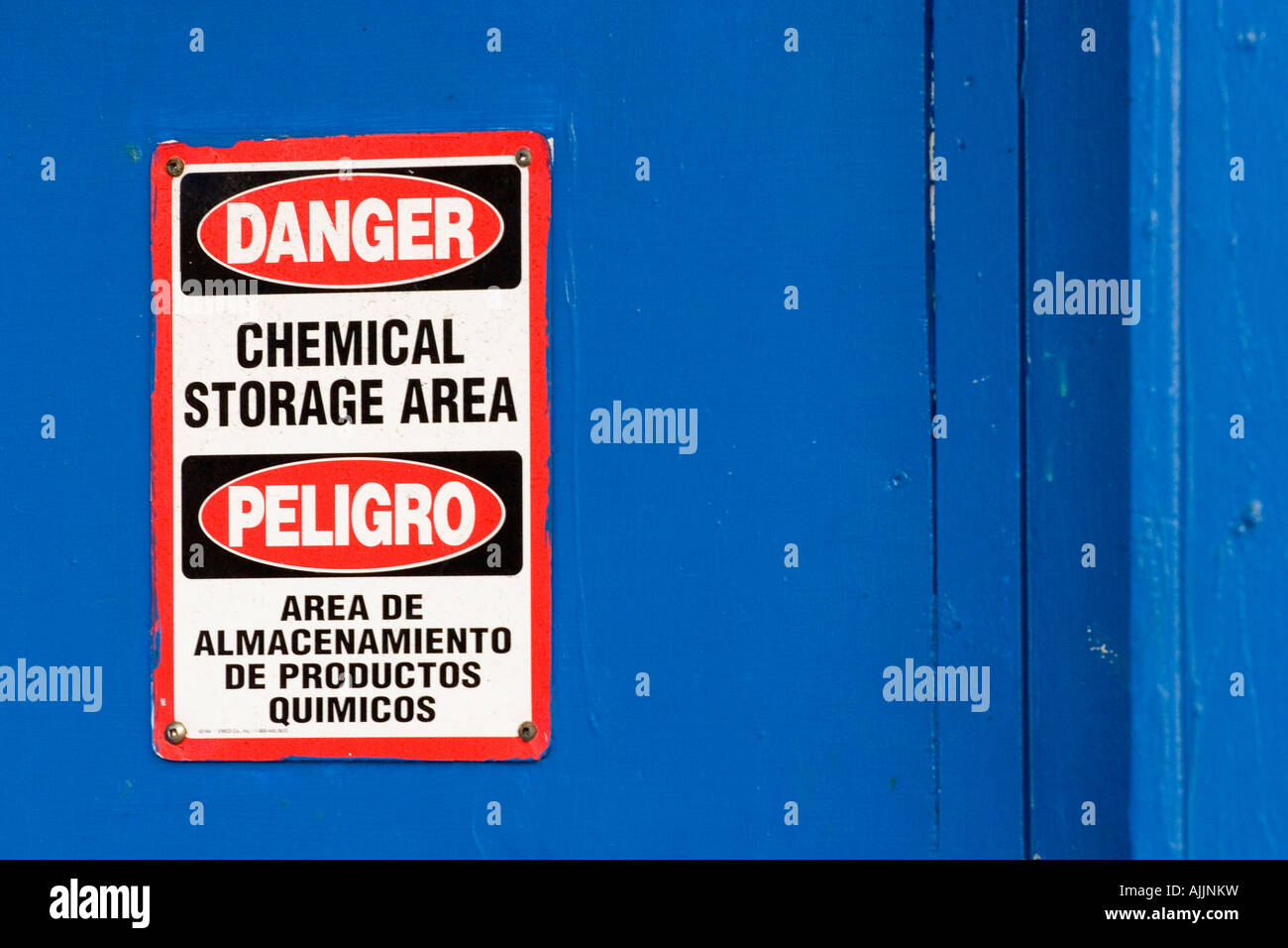 Sign warning danger chemical storage area Stock Photo - Alamy
