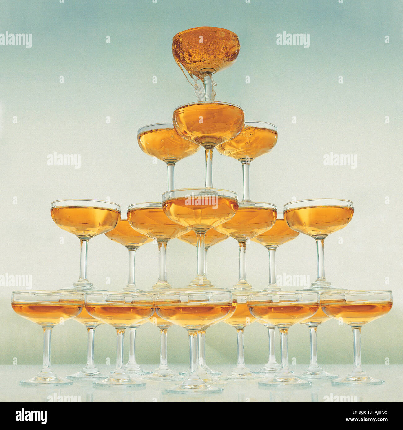 Close up of a pyramid of champagne glasses Stock Photo - Alamy