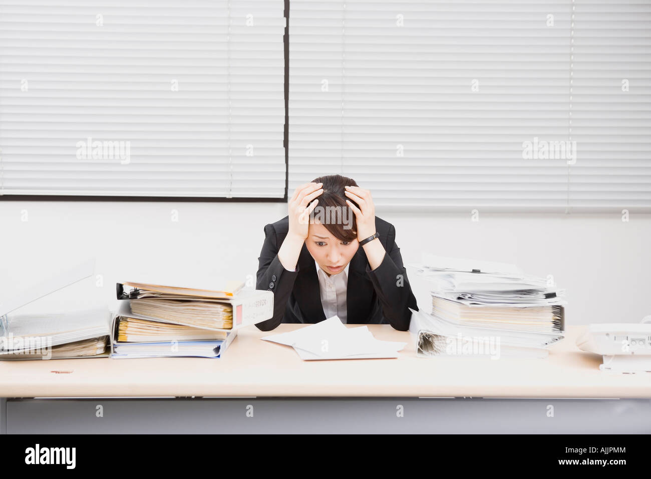 Stressed young woman Stock Photo - Alamy