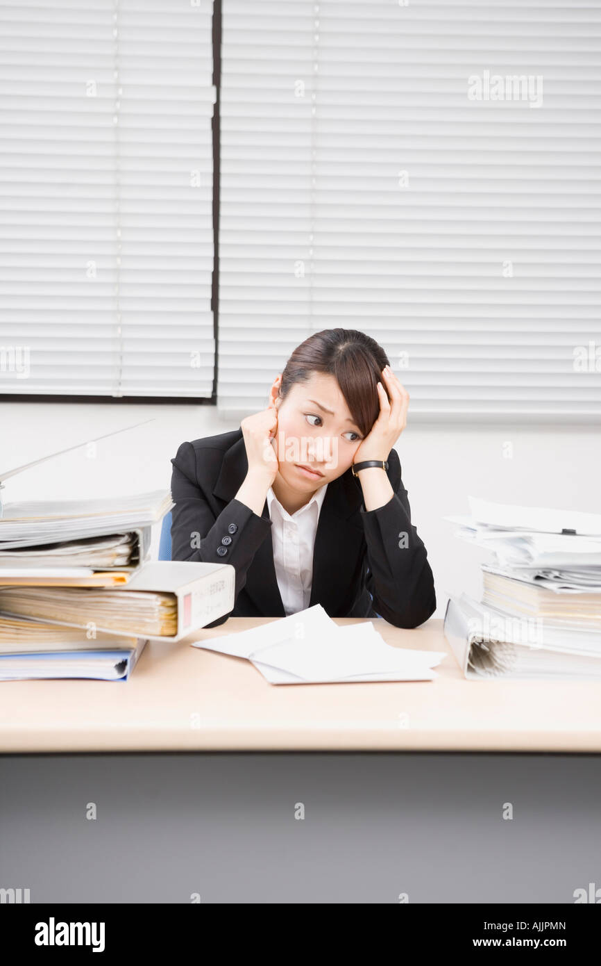 Stressed young woman Stock Photo - Alamy