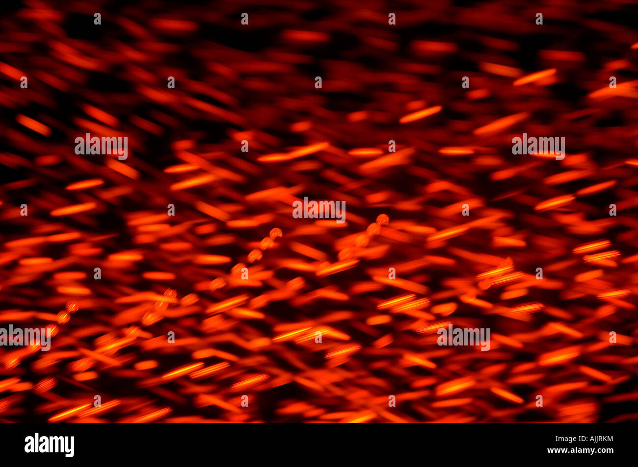 Light trails more than a little suggestive of burning embers. Camera ...