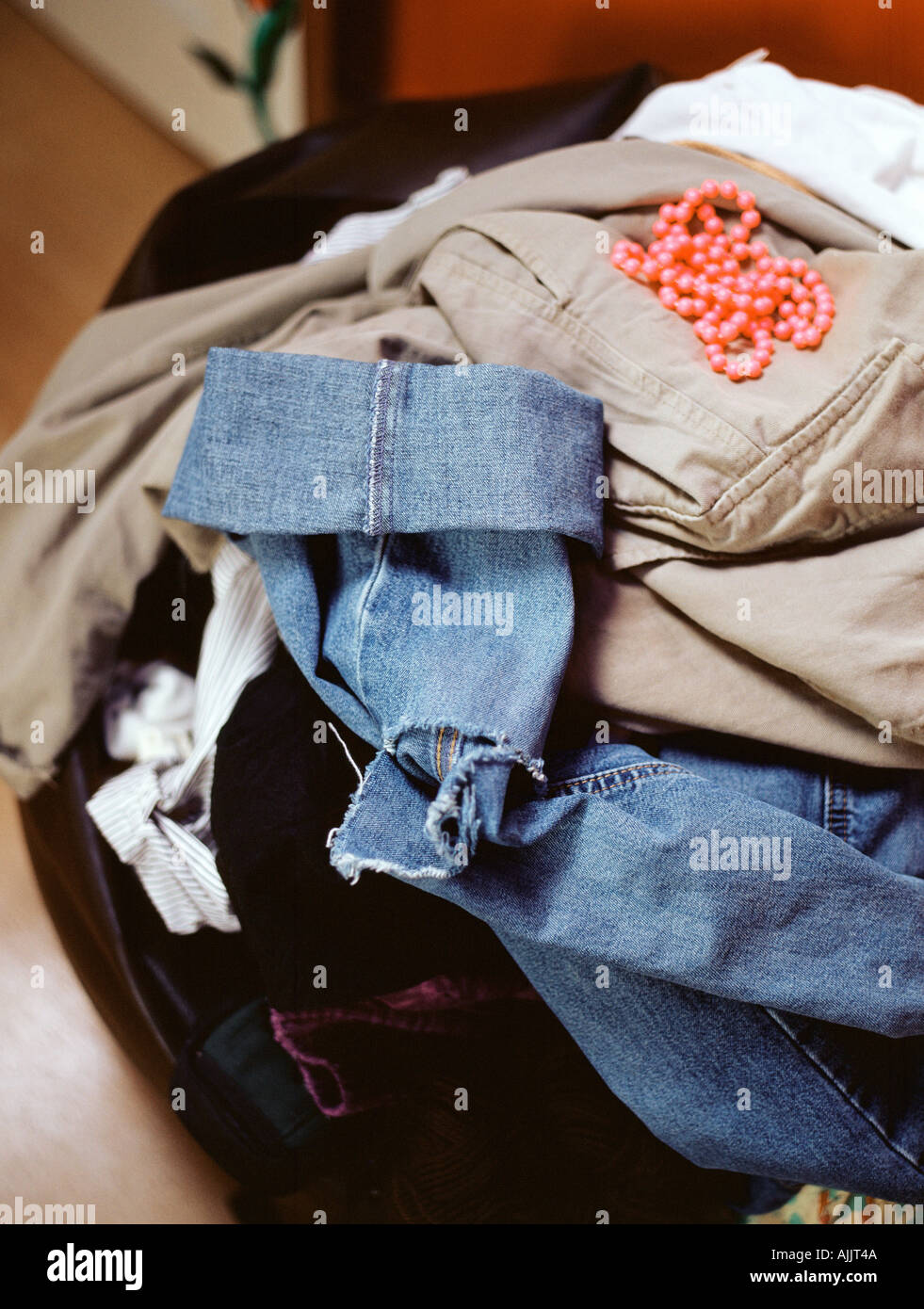 Stack of dirty clothing Stock Photo - Alamy