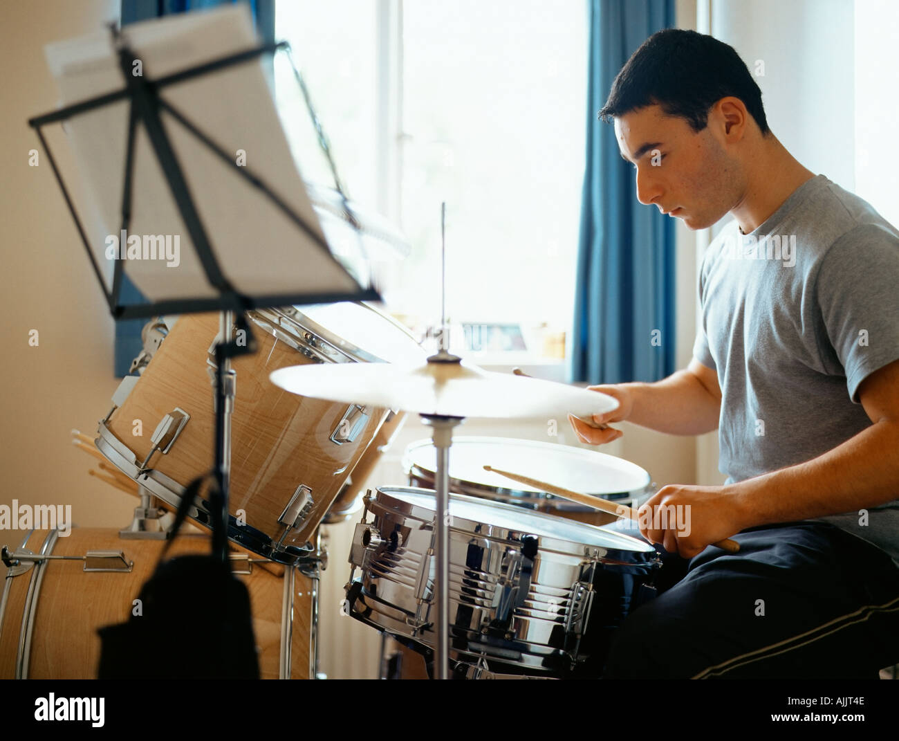 Teenage Boy Playing Drums