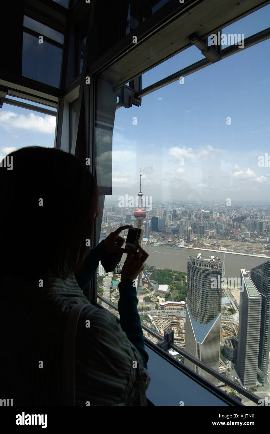 Taking of Pudong New Area and Puxi Area Skyline inside of the Jin Mao ...