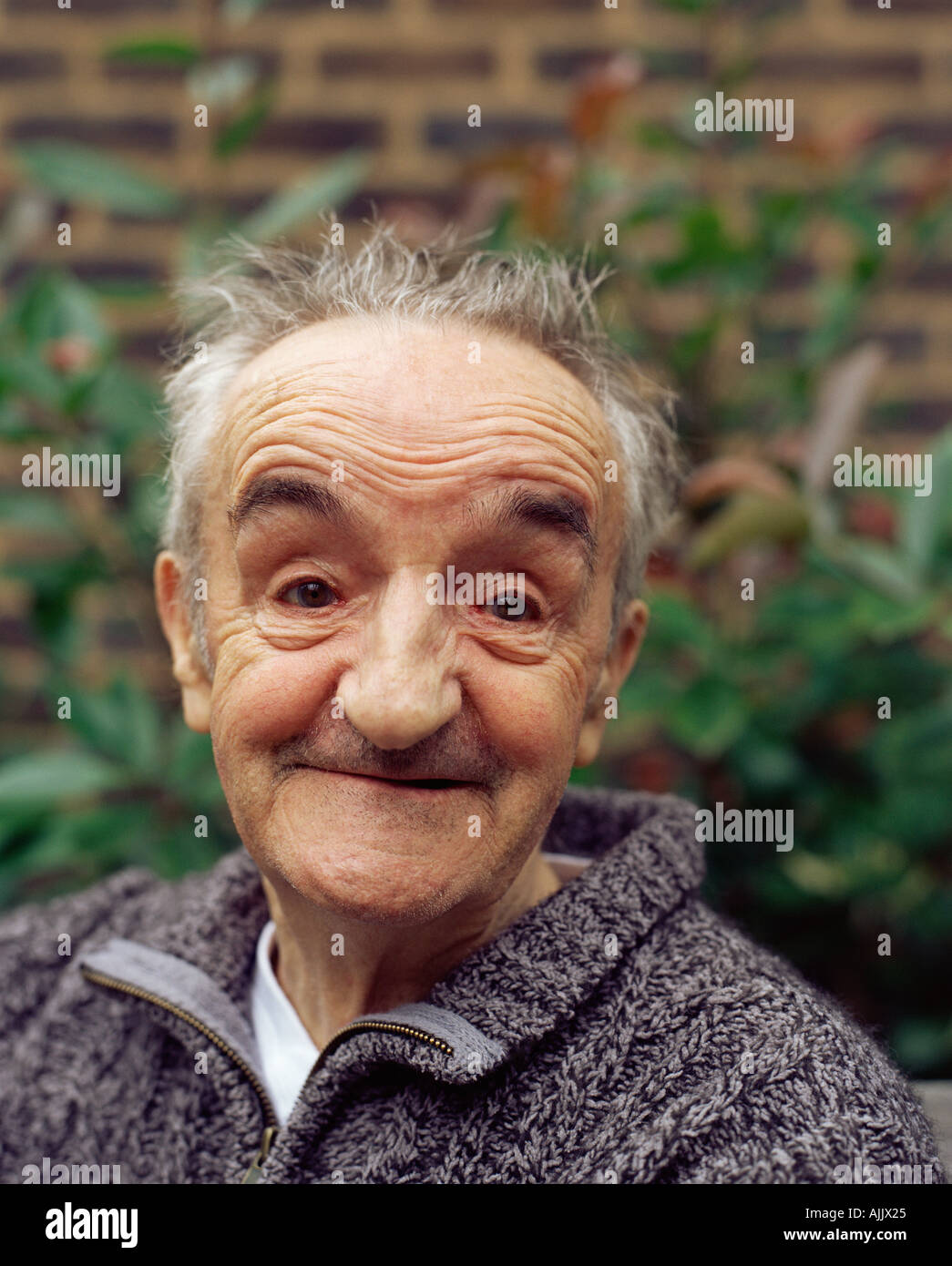 Elderly man in sweater hi-res stock photography and images - Alamy