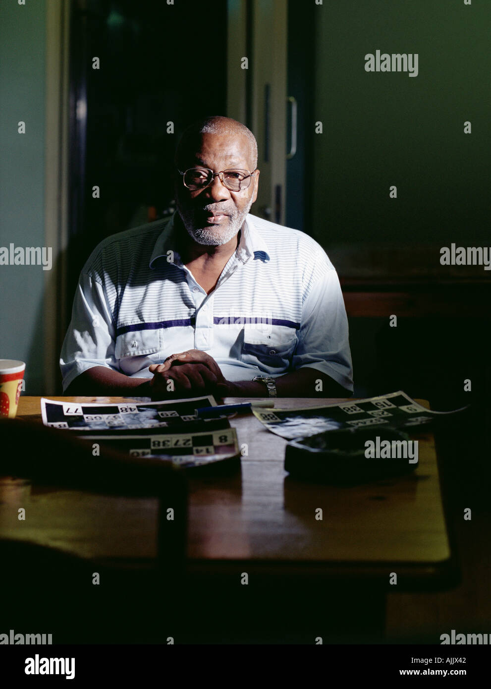 Senior man playing bingo hi-res stock photography and images - Alamy