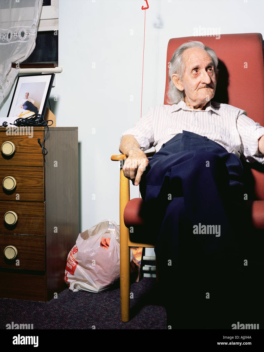 Elderly man in an armchair Stock Photo - Alamy Elderly man in an armchair Stock Photo - Alamy