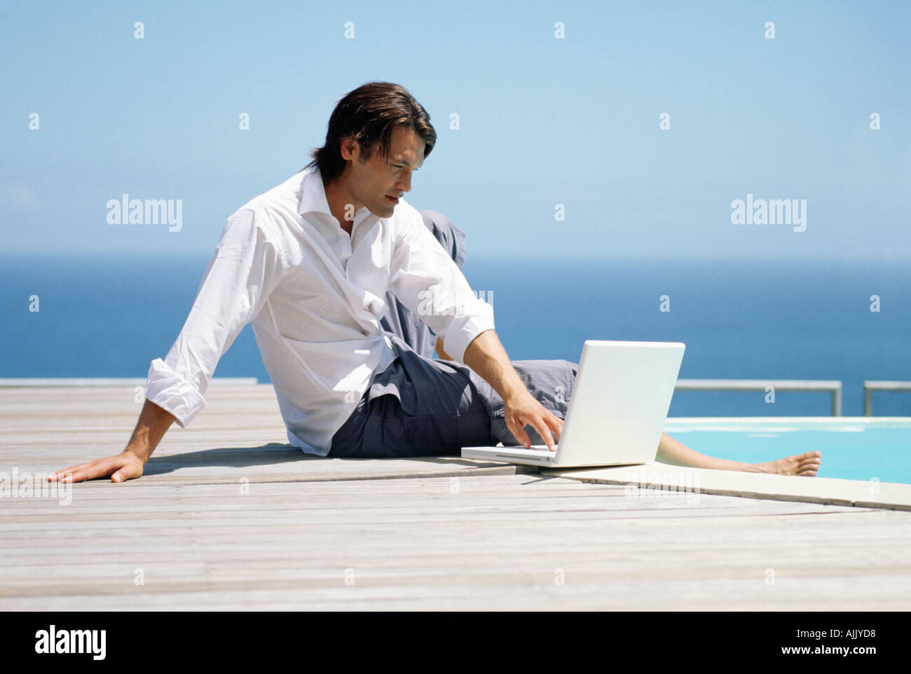 Man Outdoors Laptop Weather High Resolution Stock Photography and ...
