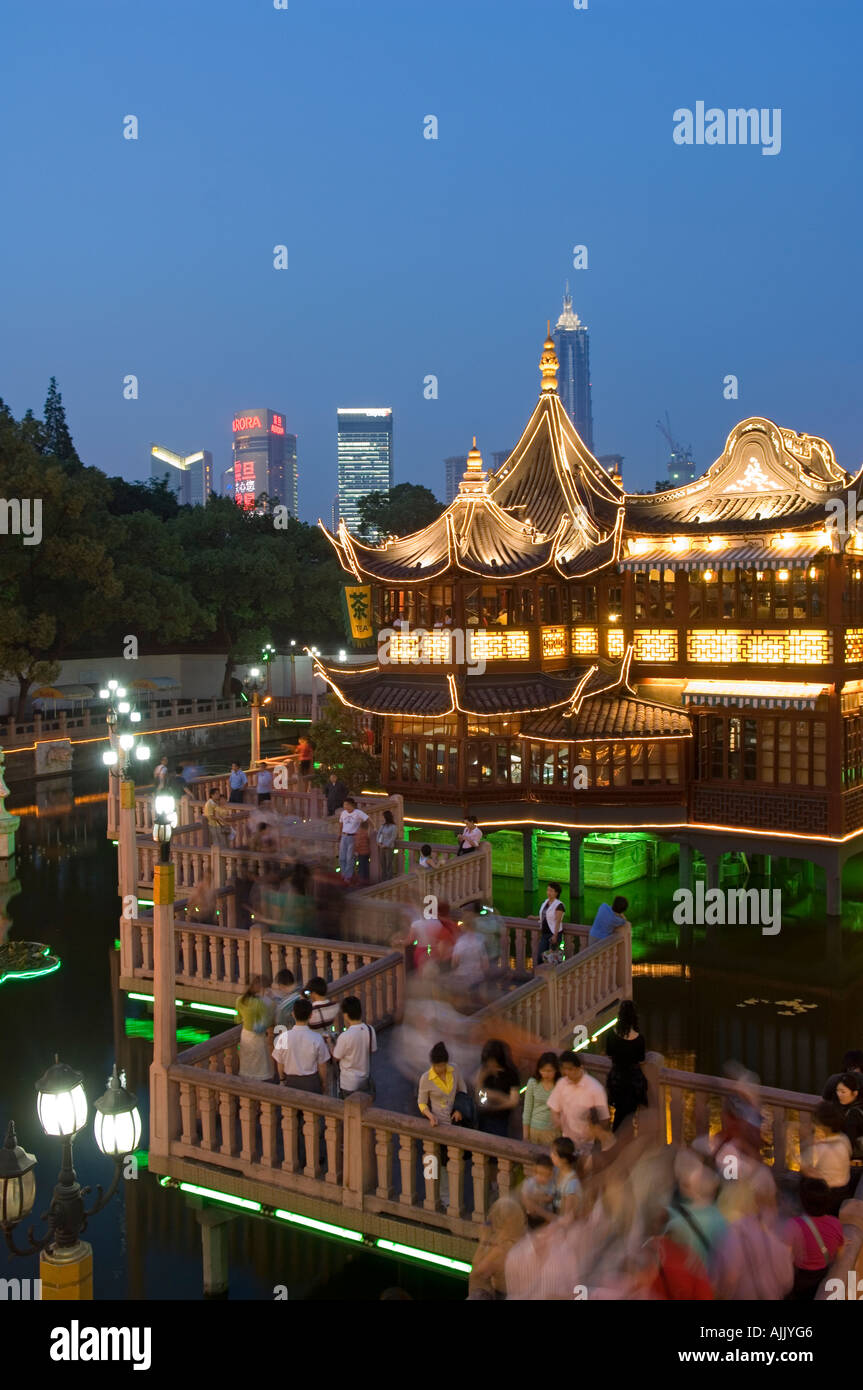 Zig zag Bridge at Yuyuan Garden Tourists cross a zig zagging bridge at ...