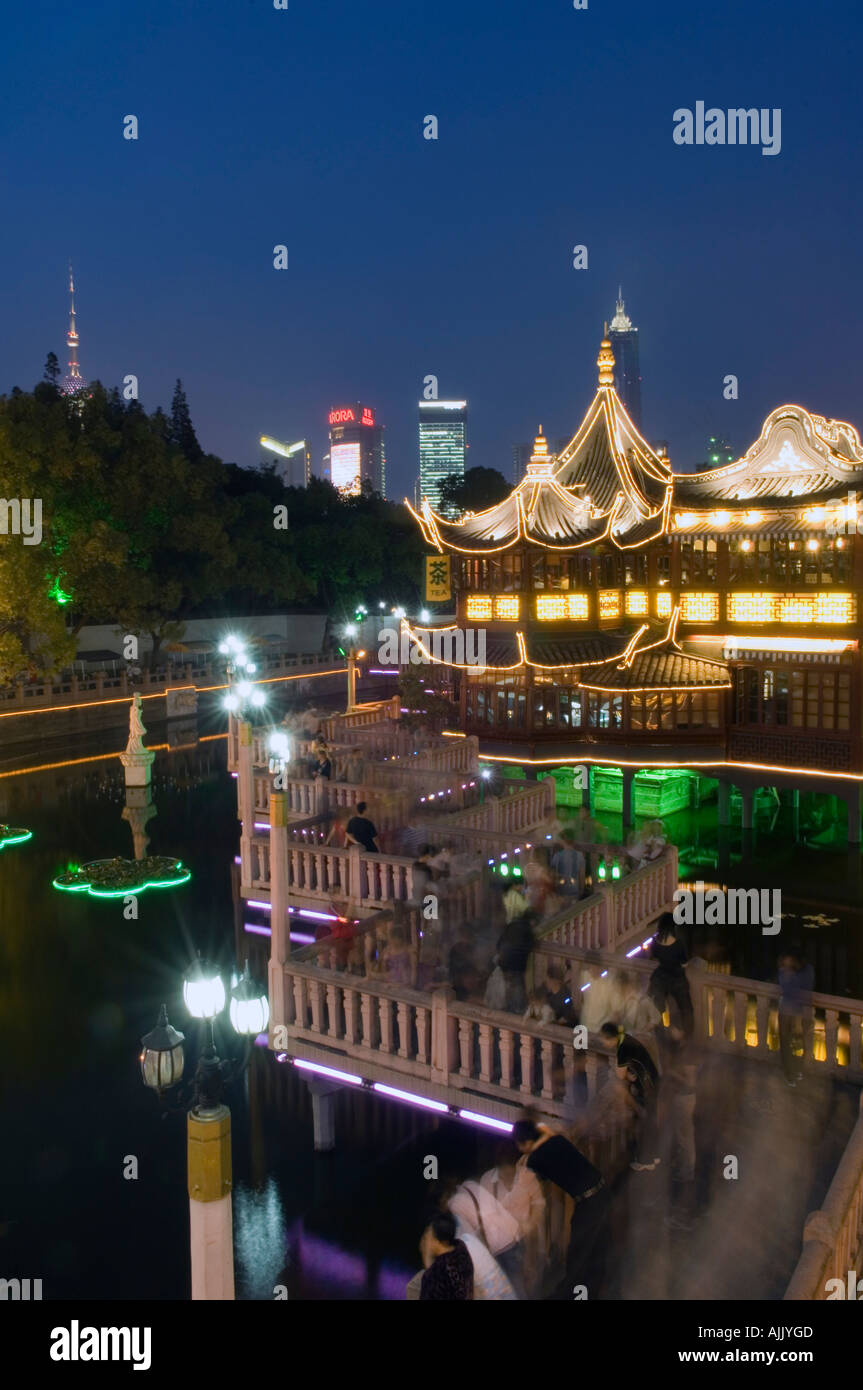 Zig zag Bridge at Yuyuan Garden Tourists cross a zig zagging bridge at ...