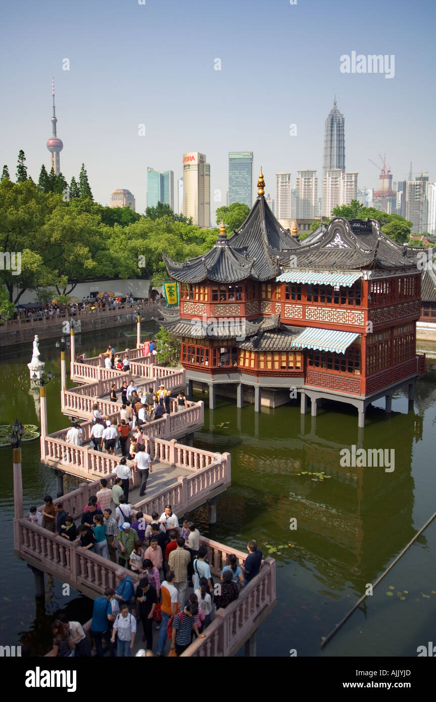 Zig zag Bridge at Yuyuan Garden Tourists cross a zig zagging bridge at ...