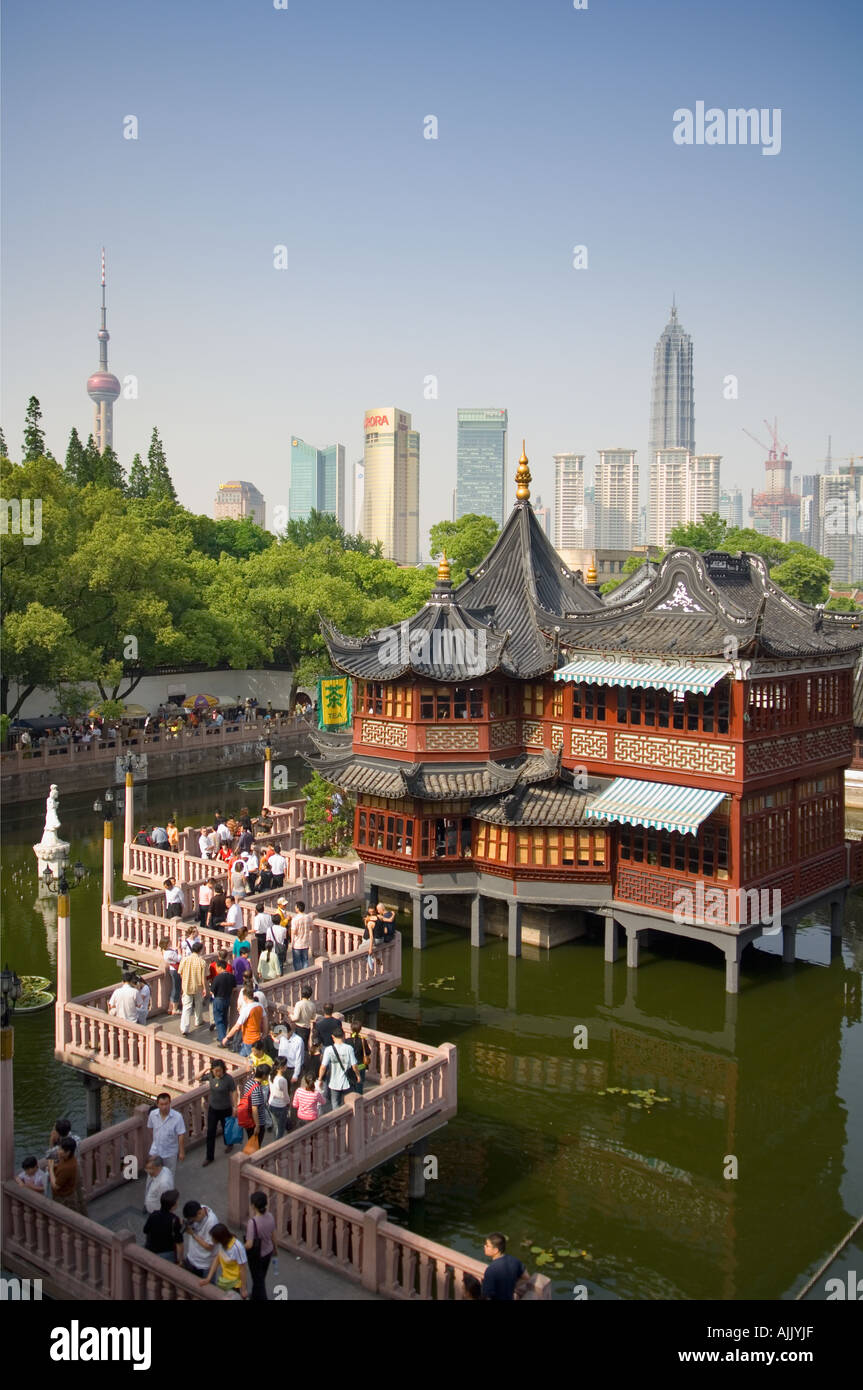 Zig zag Bridge at Yuyuan Garden Tourists cross a zig zagging bridge at ...