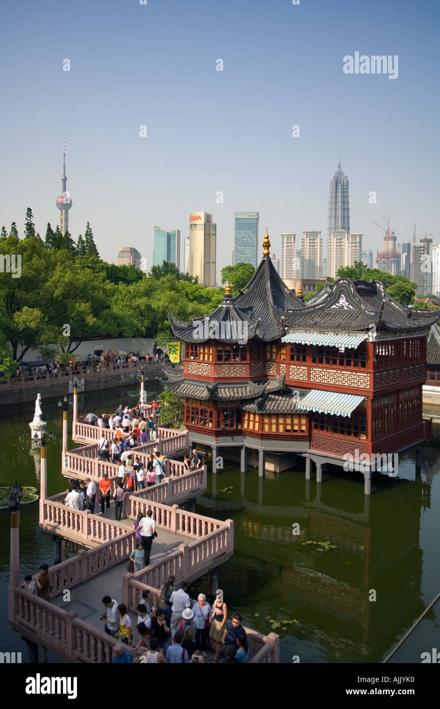 Zig zag Bridge at Yuyuan Garden Tourists cross a zig zagging bridge at ...