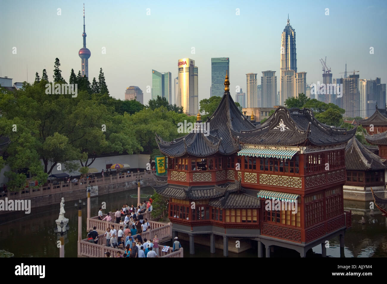 Zig zag Bridge at Yuyuan Garden Tourists cross a zig zagging bridge at ...