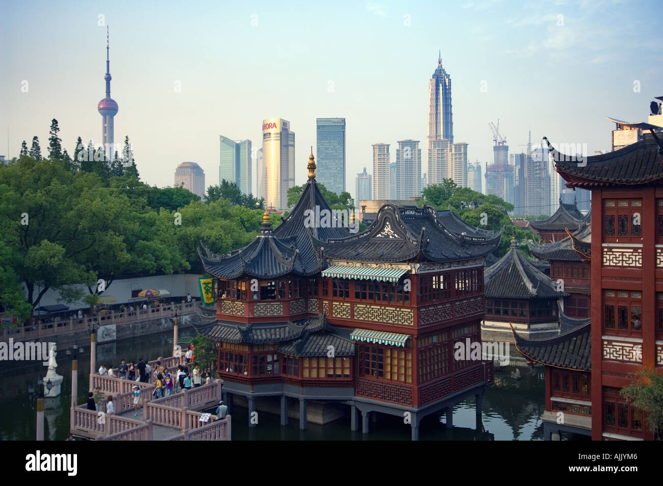 Zig zag Bridge at Yuyuan Garden Tourists cross a zig zagging bridge at ...