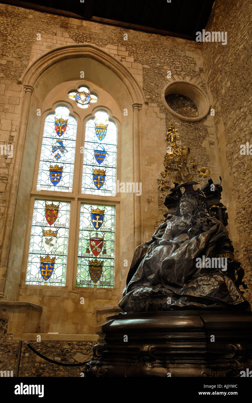 Stained glass window and sculpture of Queen Victoria in The Great Hall ...