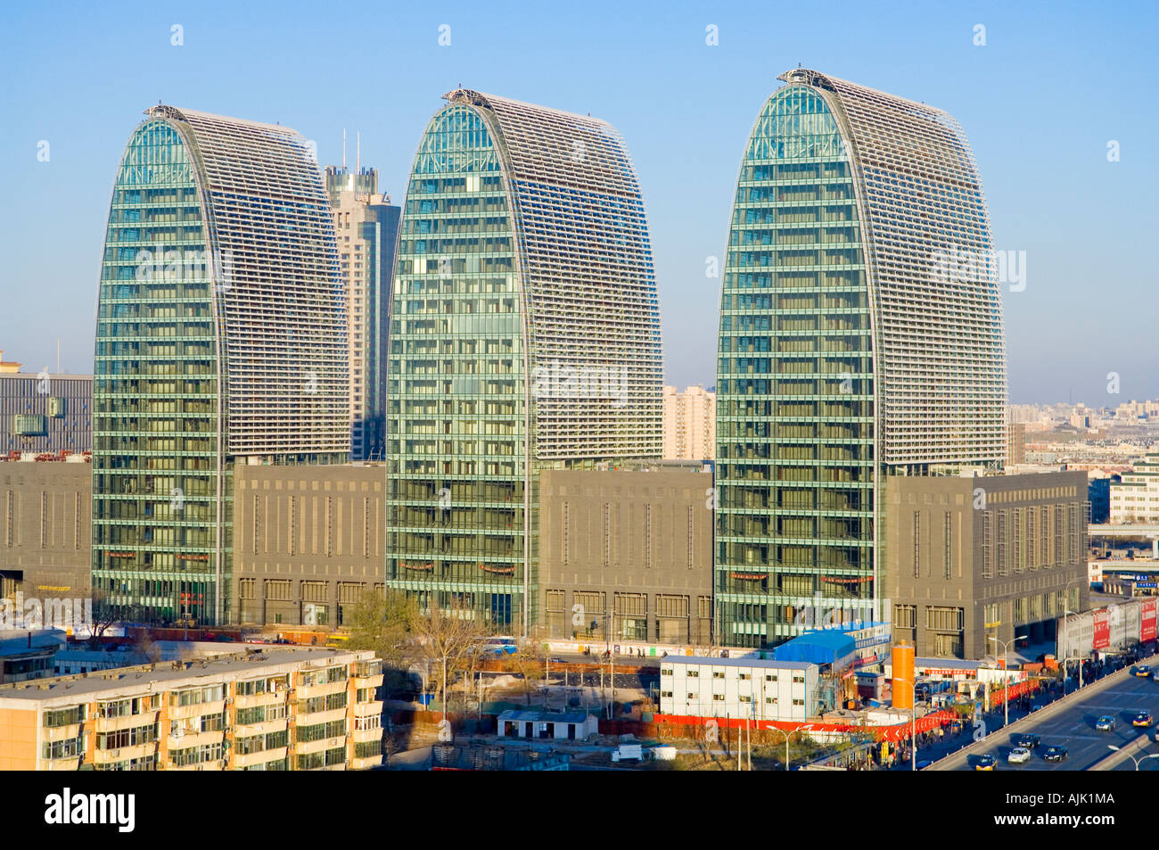 Cars on Xizhimen Street in west of Xihuan Square a new business center ...