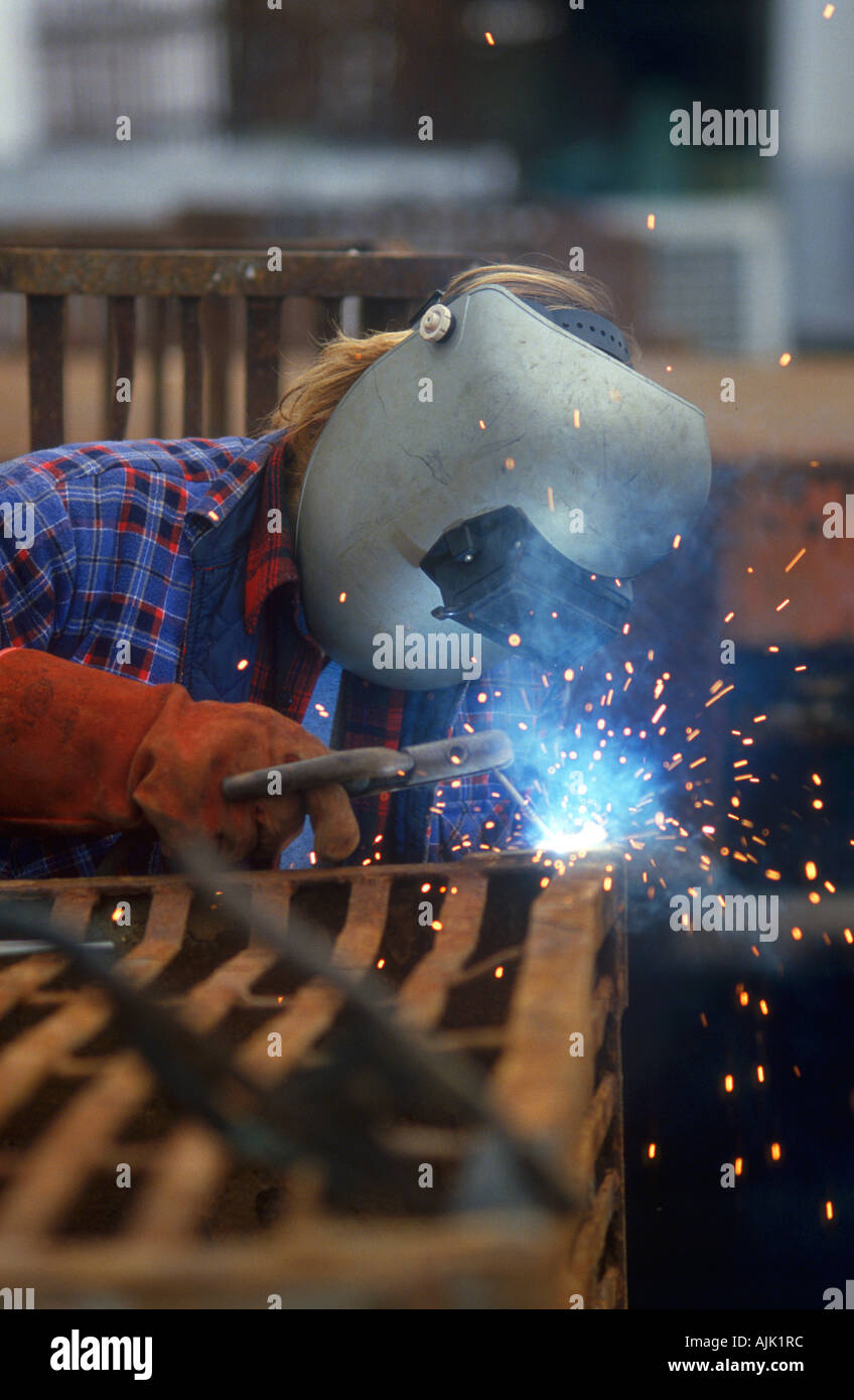 Man using arc welder Stock Photo - Alamy