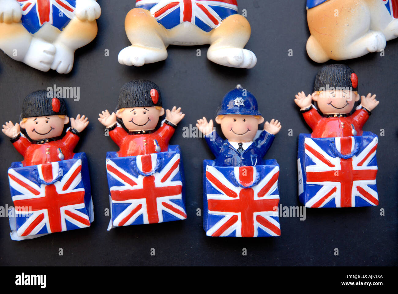 Policemen with Union Jack souvenirs on a stall in London Stock Photo ...