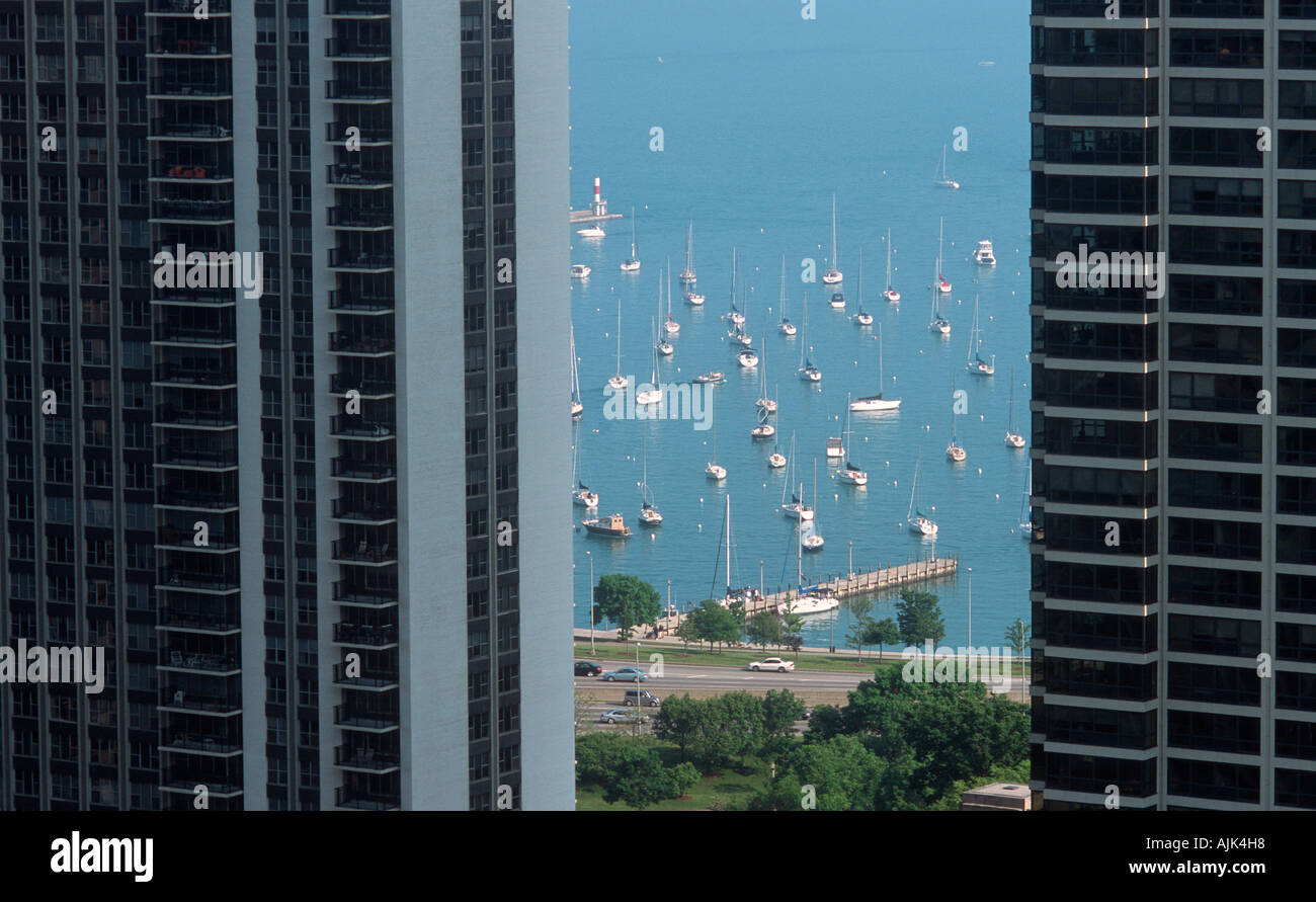 Lake Michigan shore with sailboats between high rise buildings in ...