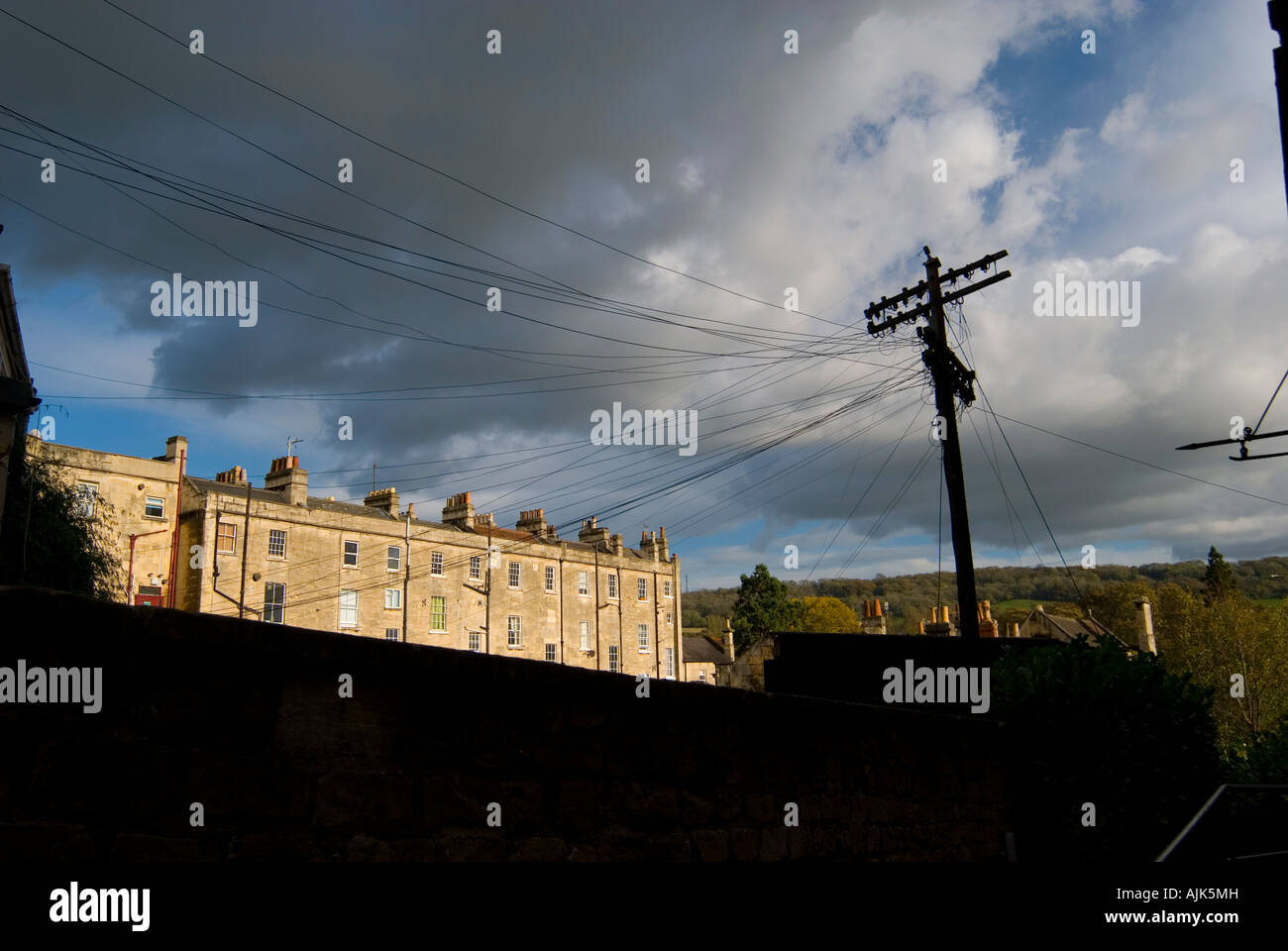 Overloaded telegraph pole in the city Stock Photo - Alamy