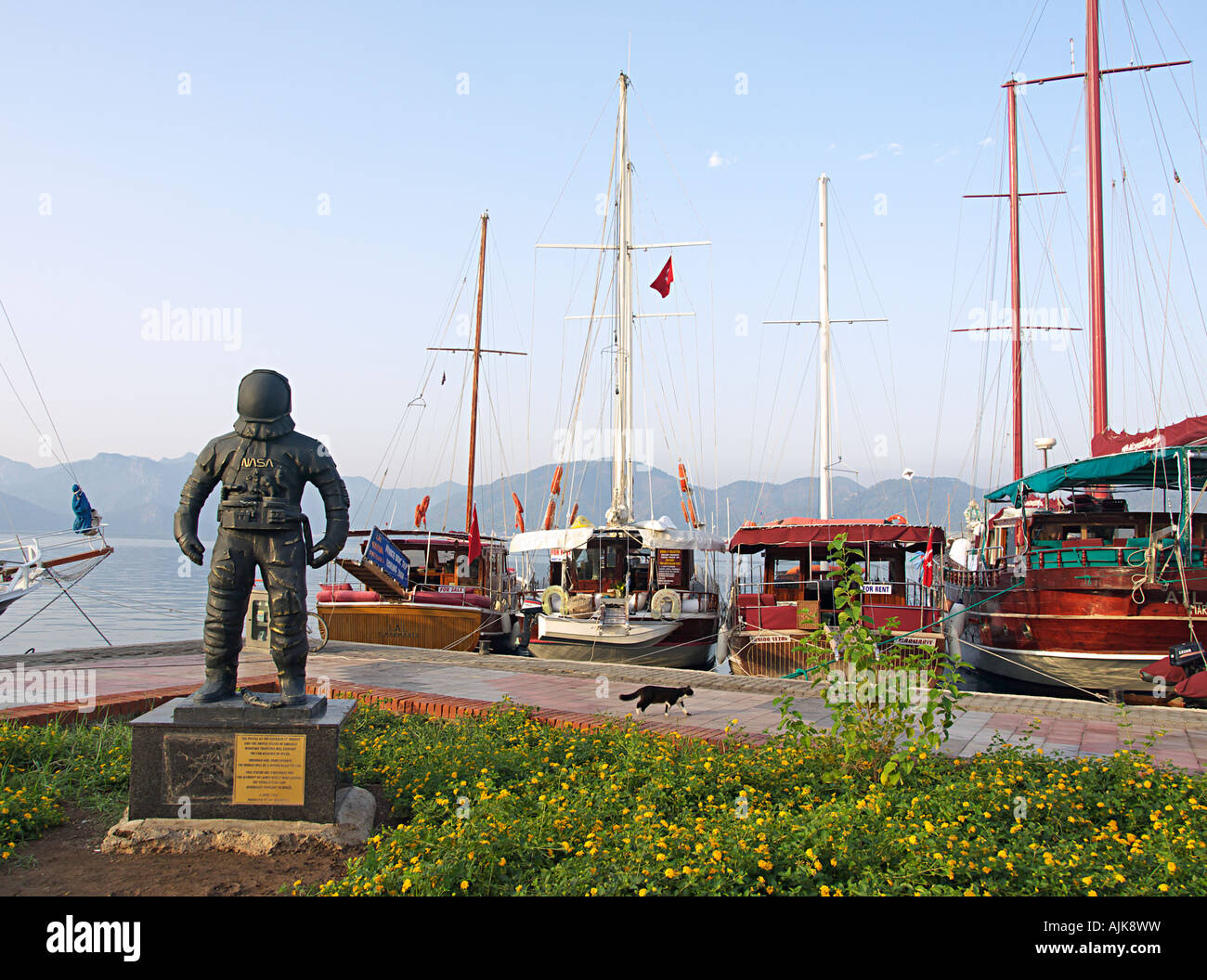 STATUE OF ASTRONAUT IN NASA SPACE SUIT AND HELMET QUAYSIDE AT MARMARIS ...