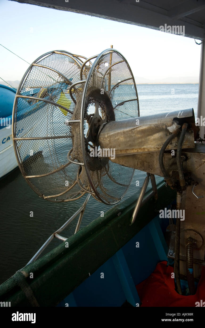 fishing boat with nets Stock Photo - Alamy